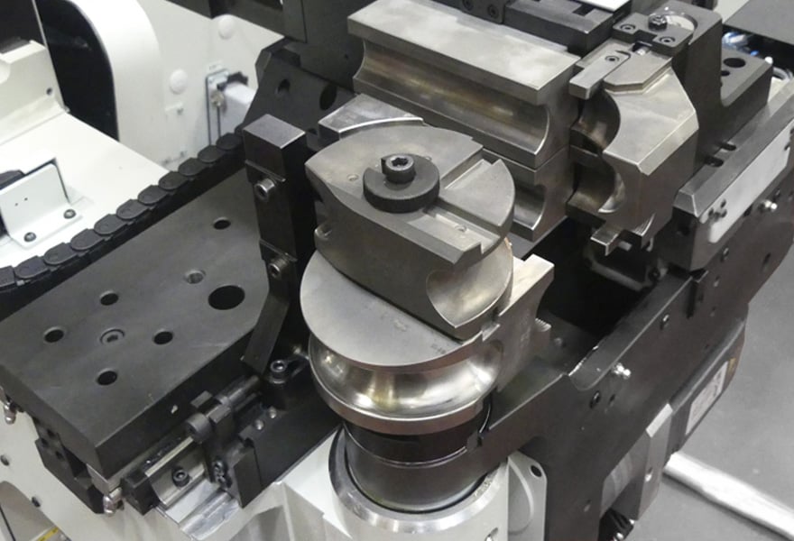 Tube processing machines for HVACR systems